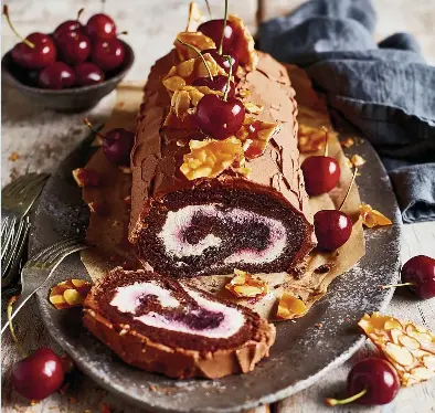 Chocolate and cherry swiss roll with almond brittle - PressReader