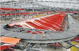 NZ Post unveils mega processing centre to deal with online retail ...