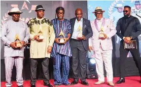 Stands Tall At - PressReader