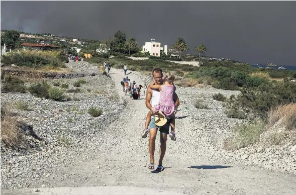 Welcome back: free stays for thousands of tourists evacuated from Rhodes wildfires - PressReader