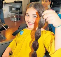 Hair today, gone tomorrow — $2000 cut for cancer - PressReader