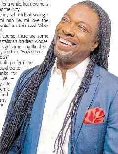 Mikey Spice trims his dreadlocks - PressReader
