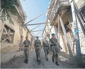 British soldiers tour Cypriot ghost town ahead of Armed Forces Day - PressReader