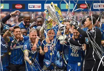 Wimbledon go up to League One - PressReader