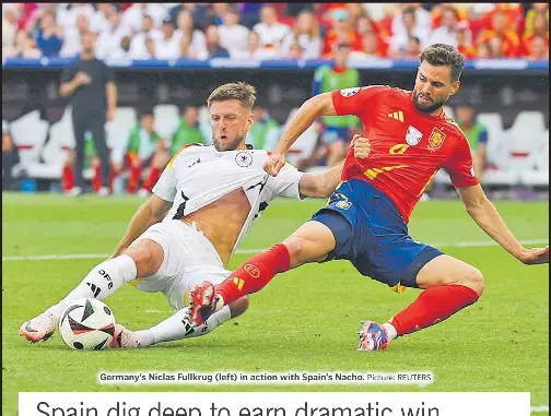 Spain dig deep to earn dramatic win - PressReader