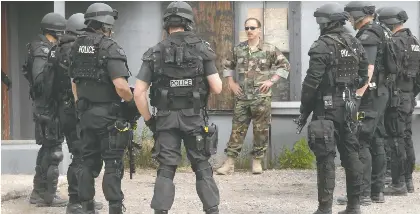 Police pivot to full-time SWAT team that will do double duty for force ...
