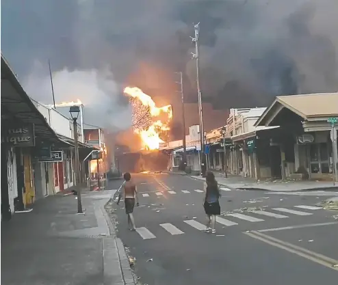 RESIDENTS FLEE INTO OCEAN TO ESCAPE WILDFIRES - PressReader