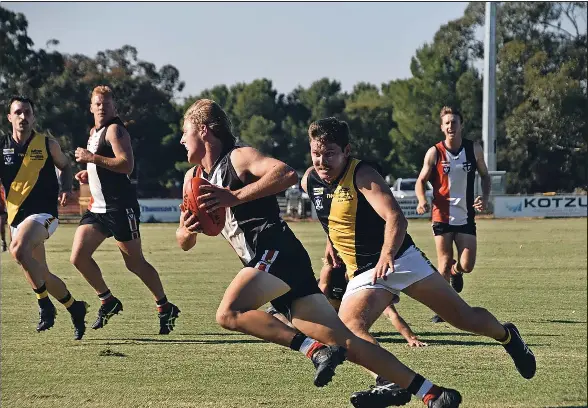 Swann kicks 15 goals for young Saints - PressReader