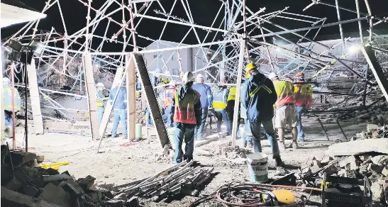 Dozens still trapped after George building tragedy - PressReader
