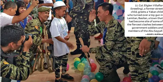 WHAT did children in Basilan surrender to soldiers? - PressReader