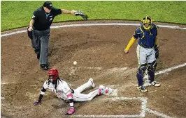 De La Cruz’s heroics help Reds hold off Brewers - PressReader