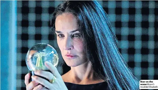 Brilliant body horror led by magic Moore Stomach-churner beautifull­y shot - PressReader