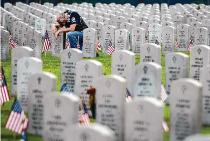 HONORING THE FALLEN - PressReader
