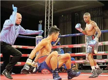 Nontshinga thrills home crowd as he retains title - PressReader