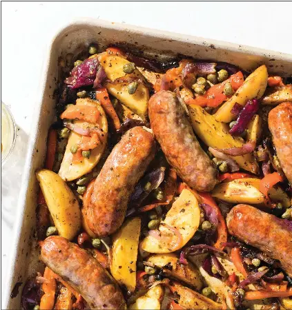 Roast Italian sausages over potatoes and peppers - PressReader