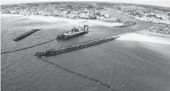 Breaking down the battle to unclog Rudee Inlet - PressReader