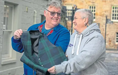 A grieving fiancee has teamed up with Runrig drummer Iain Bayne, from ...