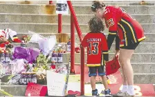 Shocked fans flock to Saddledome to show appreciati­on for Flames icon ...