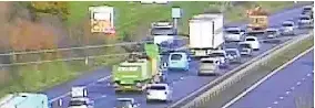 M5 lorry driver reported for crashing off motorway and into a field ...