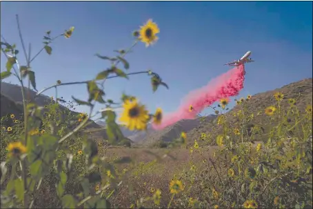 Wind, heat keep fire crews on edge - PressReader