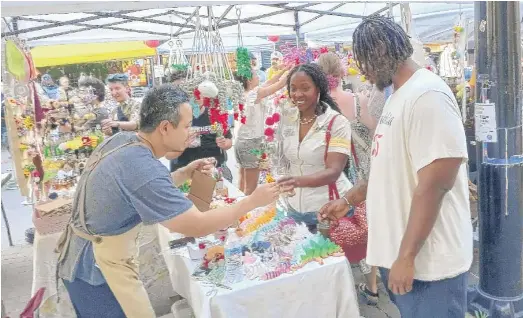 ARGYLE NIGHT MARKET BOOSTS HARD-HIT UPTOWN AHEAD OF L STATION’S REOPENING - PressReader