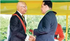 Homer Davis conferred with the Order of Distinctio­n - PressReader