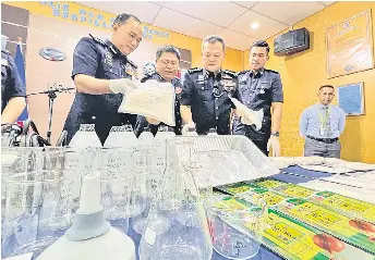 Cops nab two in raid on apartment-turned-drug lab, seize 11.9kg of meth - PressReader