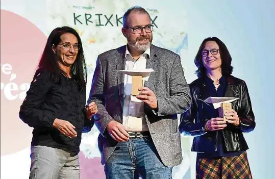 Bücher, Beifall und ein Riesenkuch­en - PressReader
