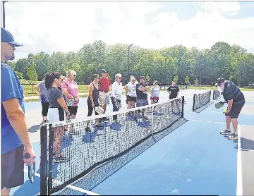 22 NEW OUTDOOR COURTS OPEN - PressReader