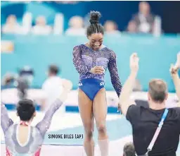 Biles nabs all-around title - PressReader