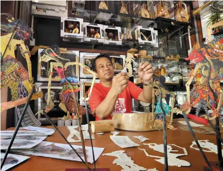 Arts thrive in the hands of wayang kulit puppeteer - PressReader