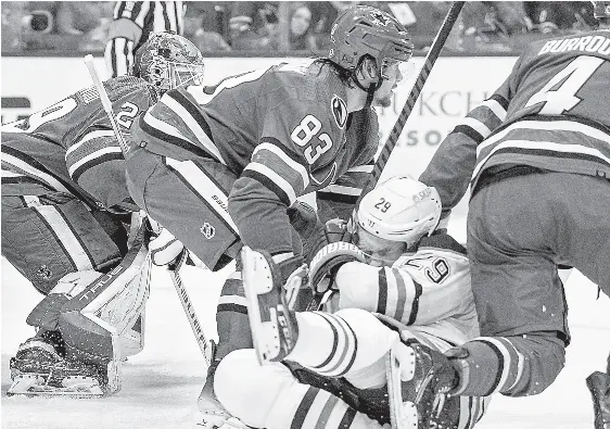 Sharks send Oilers to rock bottom - PressReader