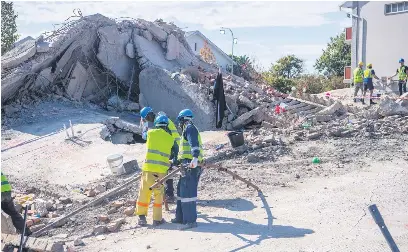 ‘Basement may hold survivors’ - PressReader