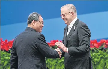 Australia vows to ‘work with China’ - PressReader