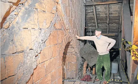 Bruce Manson in St Drostan’s Church, Markinch, where a doorway hidden ...