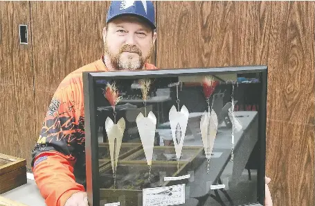 Antique fishing lures draw enthusiast­s to show in city - PressReader