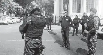 BALAS Y GRANADA PARA 5 DETENIDOS - PressReader