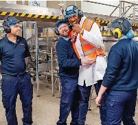 Heavyweigh­t Joshua packs a punch on visit to factory - PressReader