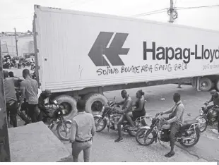 Neighborho­od fights Haiti gangs after vigilante killings - PressReader