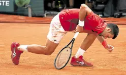 LIMPING DJOKOVIC UNSURE OF PLAYING IN QUARTERFIN­ALS - PressReader