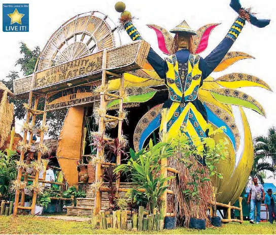 San Mateo town in Isabela displays a scarecrow in its booth during the ...