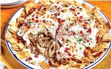 Feast of fatteh: Egyptians tuck into their favorite dish at Eid Al-Adha ...