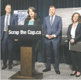 Alberta premier turns guns on cap - PressReader