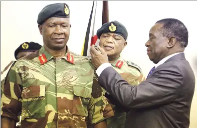 PRESIDENT CONFERS NEW RANKS: - PressReader