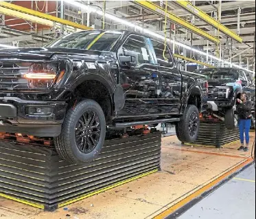 Ford trims profit forecast over costs - PressReader