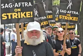 Striking actors take to picket lines as Hollywood shuts down - PressReader