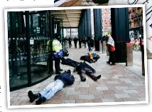 Protestors stage ‘ diein’ at offices of bank - PressReader