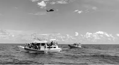 More than 100 migrants stranded, await help - PressReader