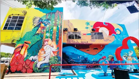 Twin sisters share a career as mural artists - PressReader