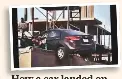 How a car landed on top of a wall in Jeddah - PressReader